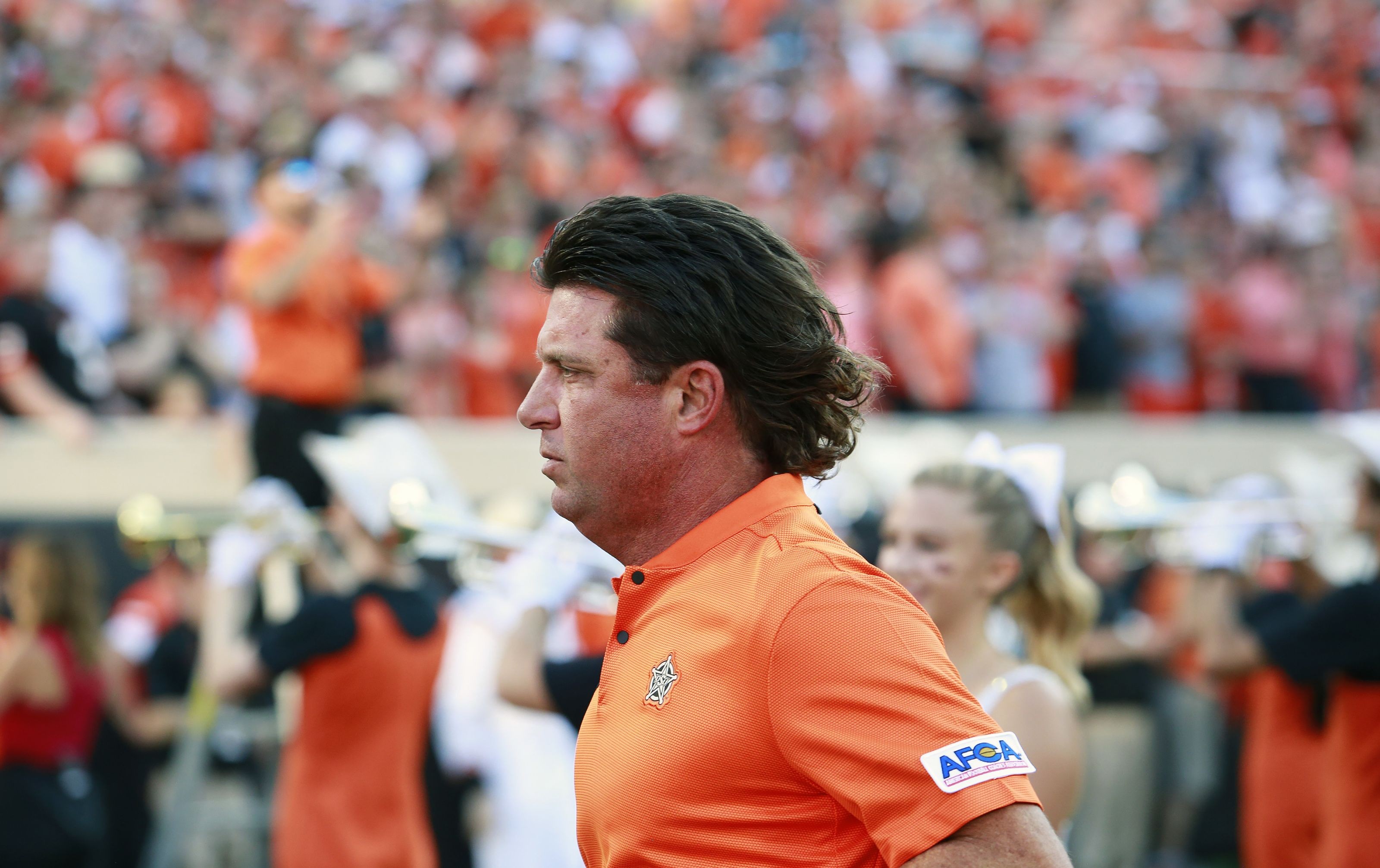 Texas Football: ESPN’s Acho wants to cut Gundy’s mullet for Christmas