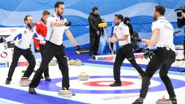 Italian curler roars after hitting shot to qualify for Olympics (video)