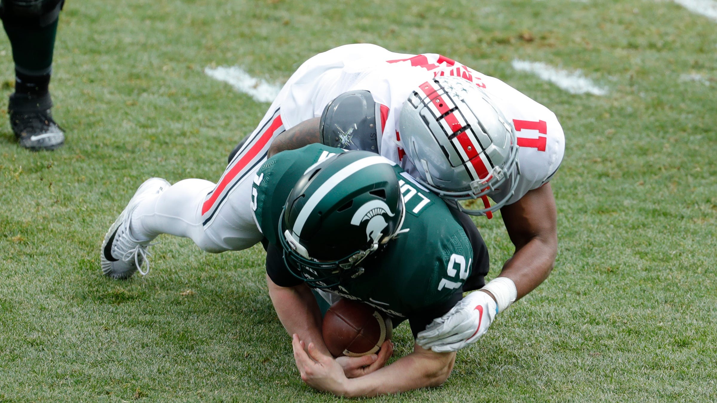 Michigan State football's quarterback spot in flux again after Rocky ...