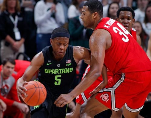 Michigan State clamps down on Ohio State; how bad is Nick Ward's hand?