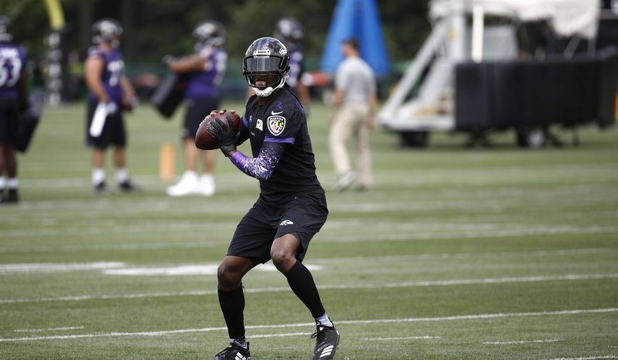 The Ravens' quarterback room is packed, but Griffin III is mentoring ...