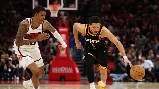 Report: Houston has repeatedly shown trade interest in Suns star Devin ...