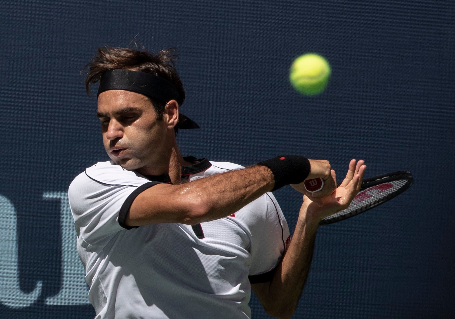 Roger Federer Heats Up on Court and Off