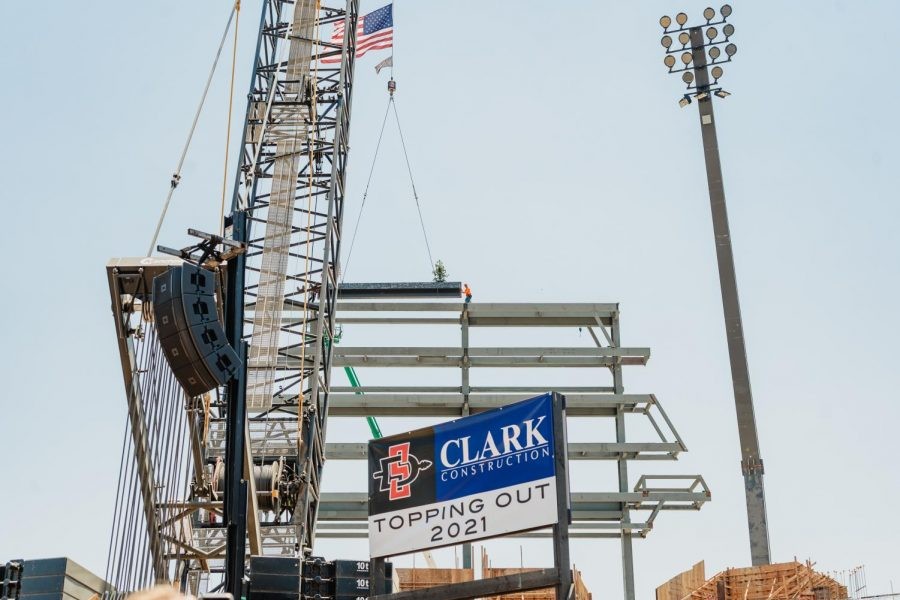 Construction crews put symbolic final steel beam into Aztec Stadium