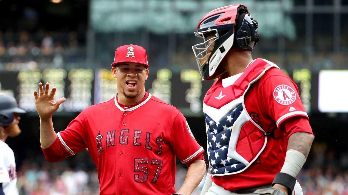 Calhoun homers, Angels end Mariners' streak with 7-4 win