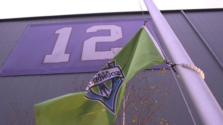 Sounders championship flag flies at Seahawks training facility