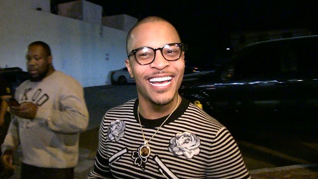 T.I. -- Punks TMZ Camera Guy ... You Wanna Bet ME on the Falcons??? (VIDEO)