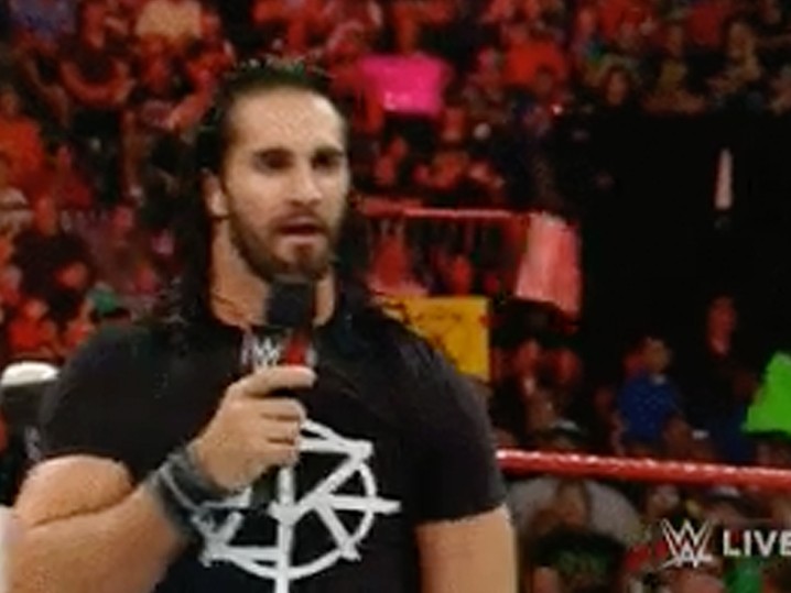 Seth Rollins -- WWE Security Takes Out Ring Invader ... YOU GO DOWN ...