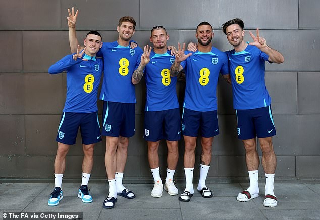 Back to work after Man City's four-day bender: Jack Grealish grins ...