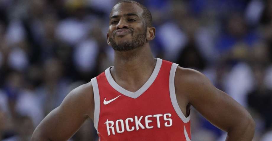 Chris Paul plays through knee pain in Rockets debut