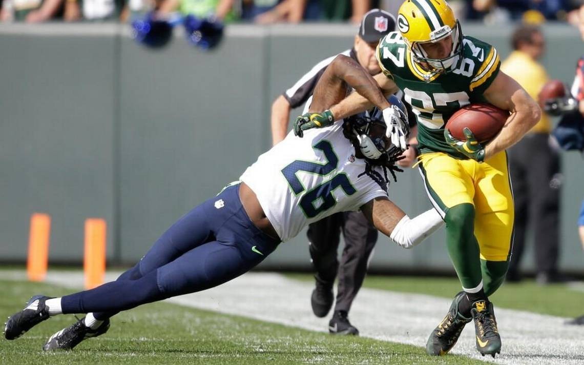 Cliff Avril: Officials give Packers 2-time NFL MVP Aaron Rodgers ...